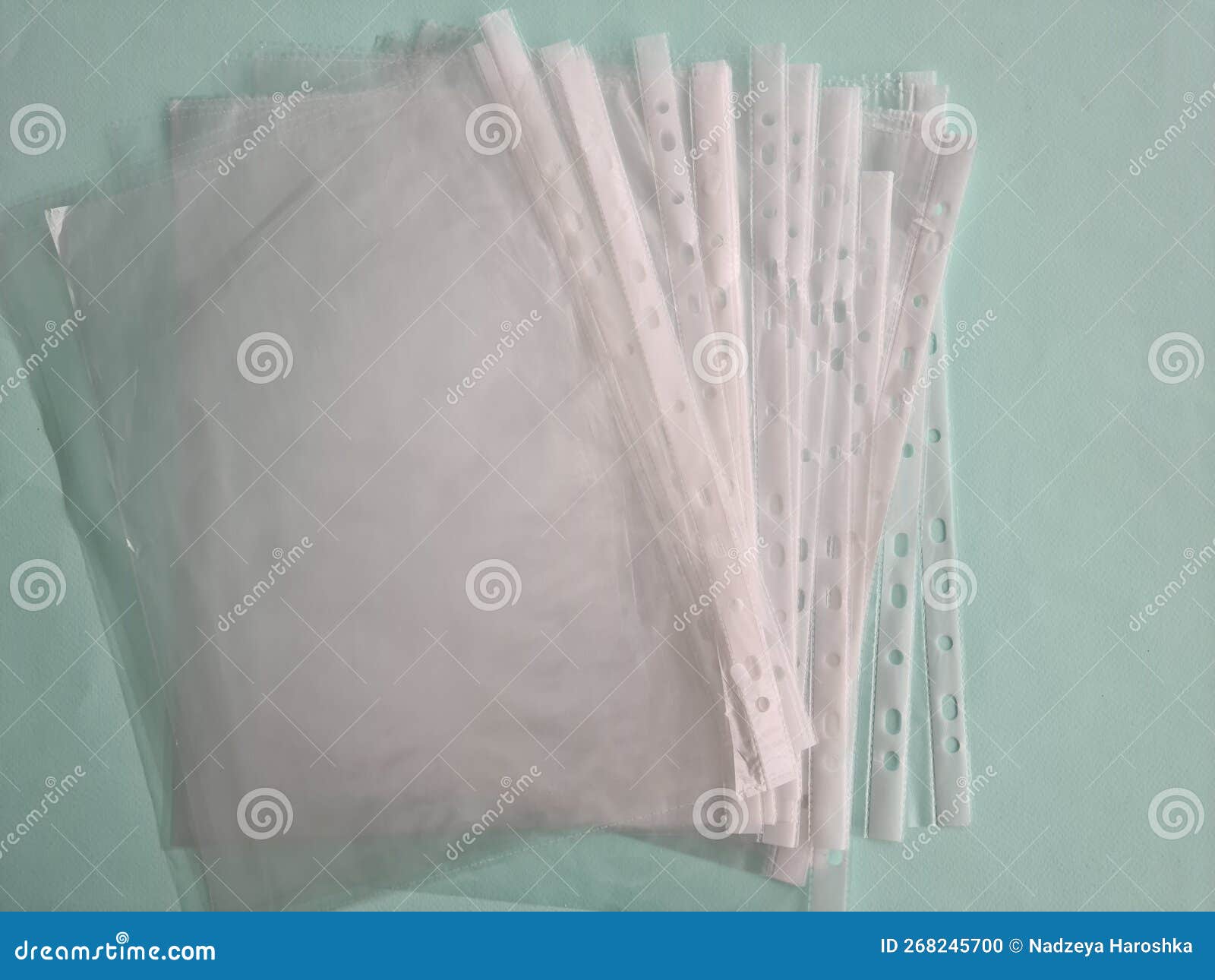Office Stack of White Transparent Files for Documents Closeup on Blue ...