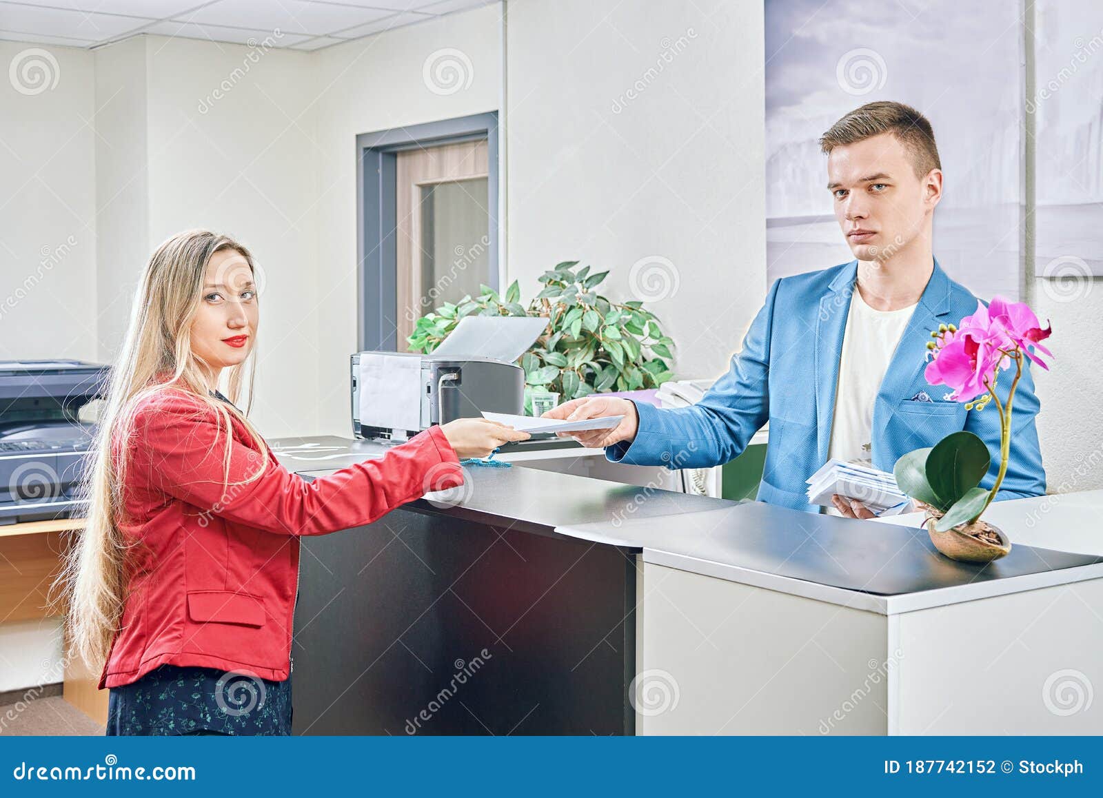 Office Staff at the Reception. Male Secretary Manager Stock Photo ...