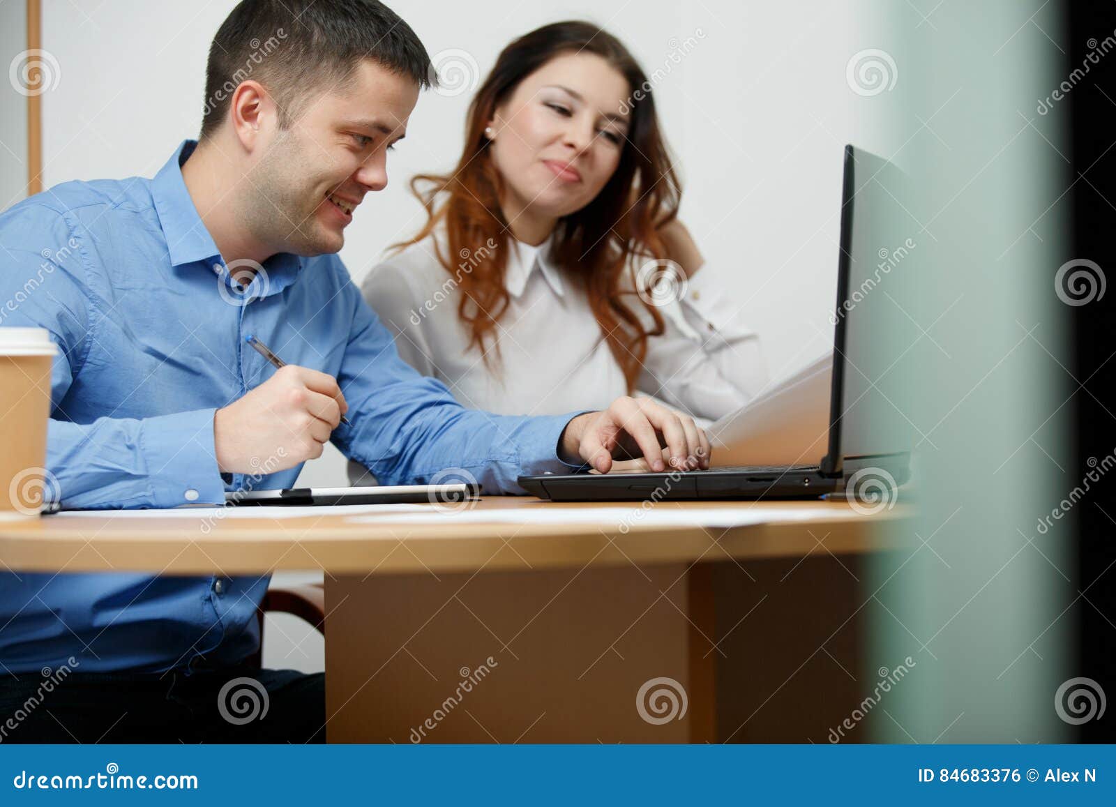 Office Staff Sitting at Desk Stock Photo - Image of sitting, looking ...