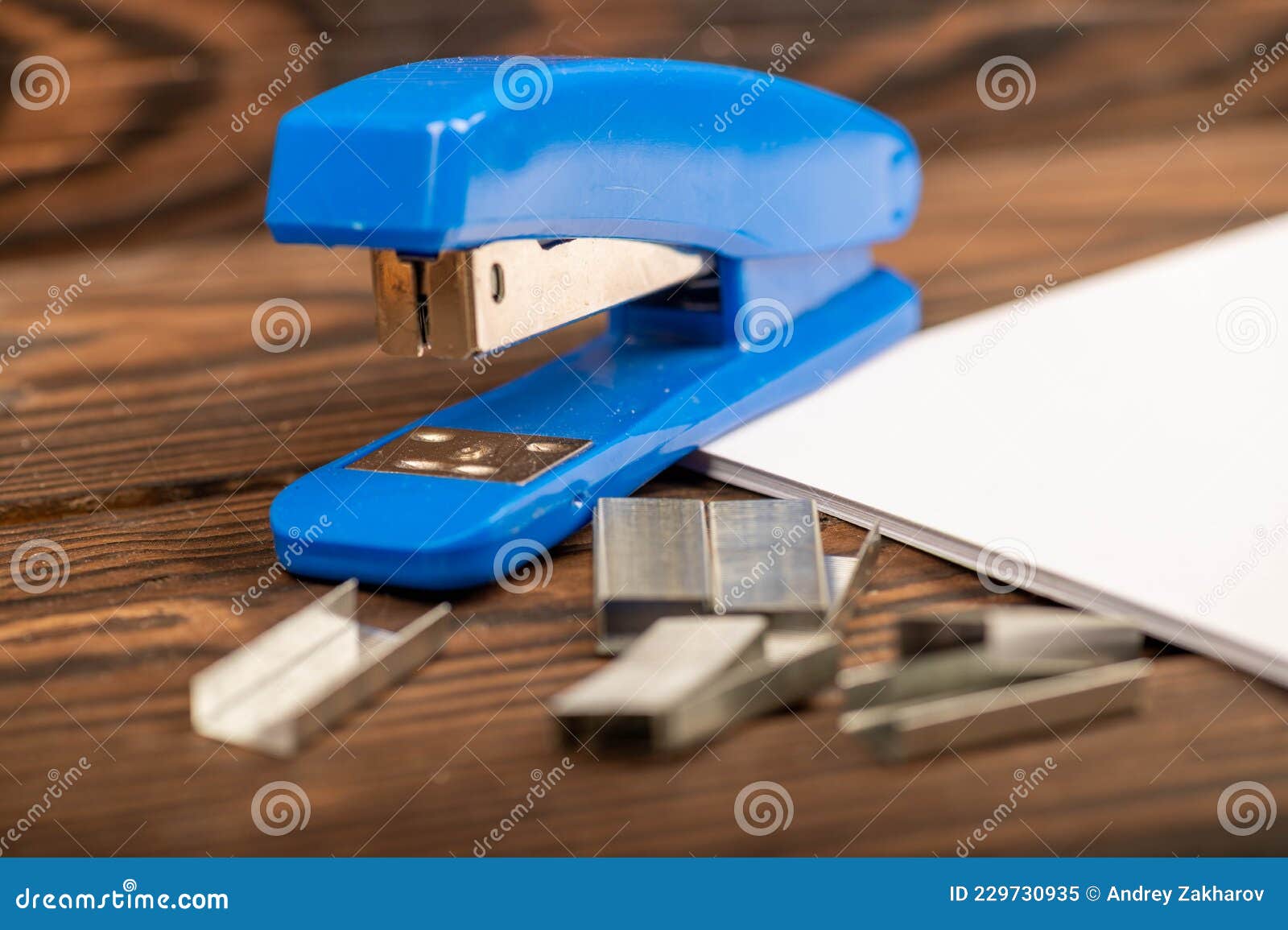 Office Stapler, Stapler Staples and White Paper on the Table, Close-up ...