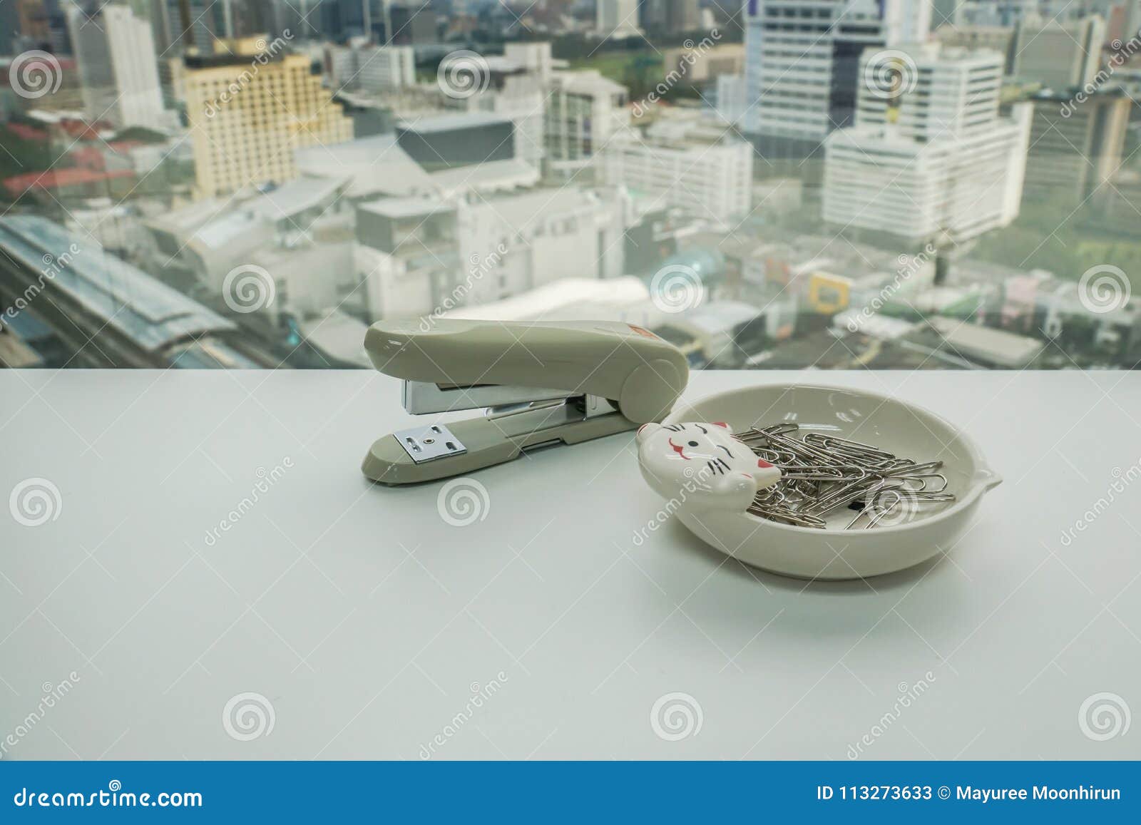Office Stationary Stapler and Paper Clip on White Table for Documents ...