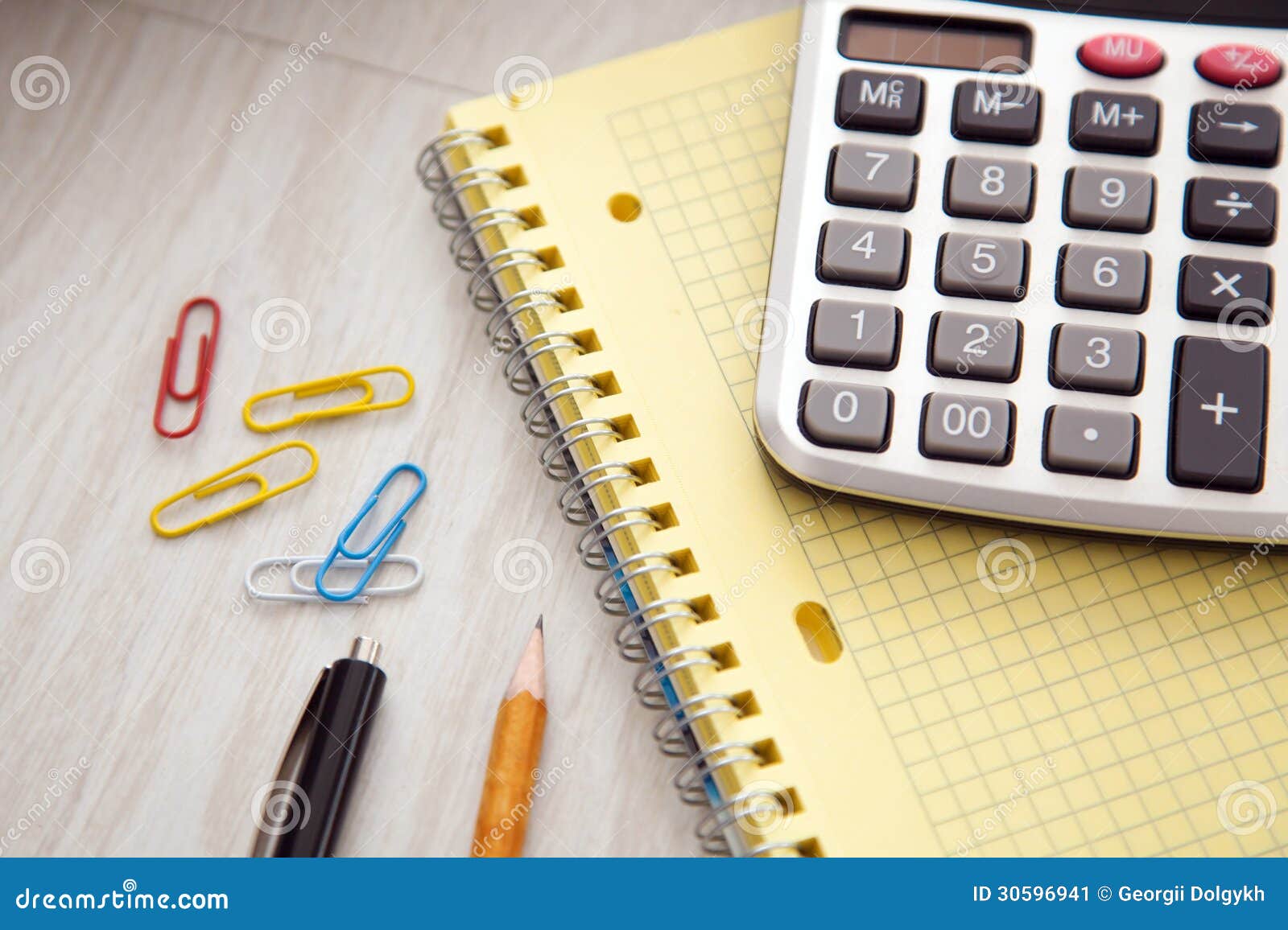 Office supplies on a table stock image. Image of digit - 30596941