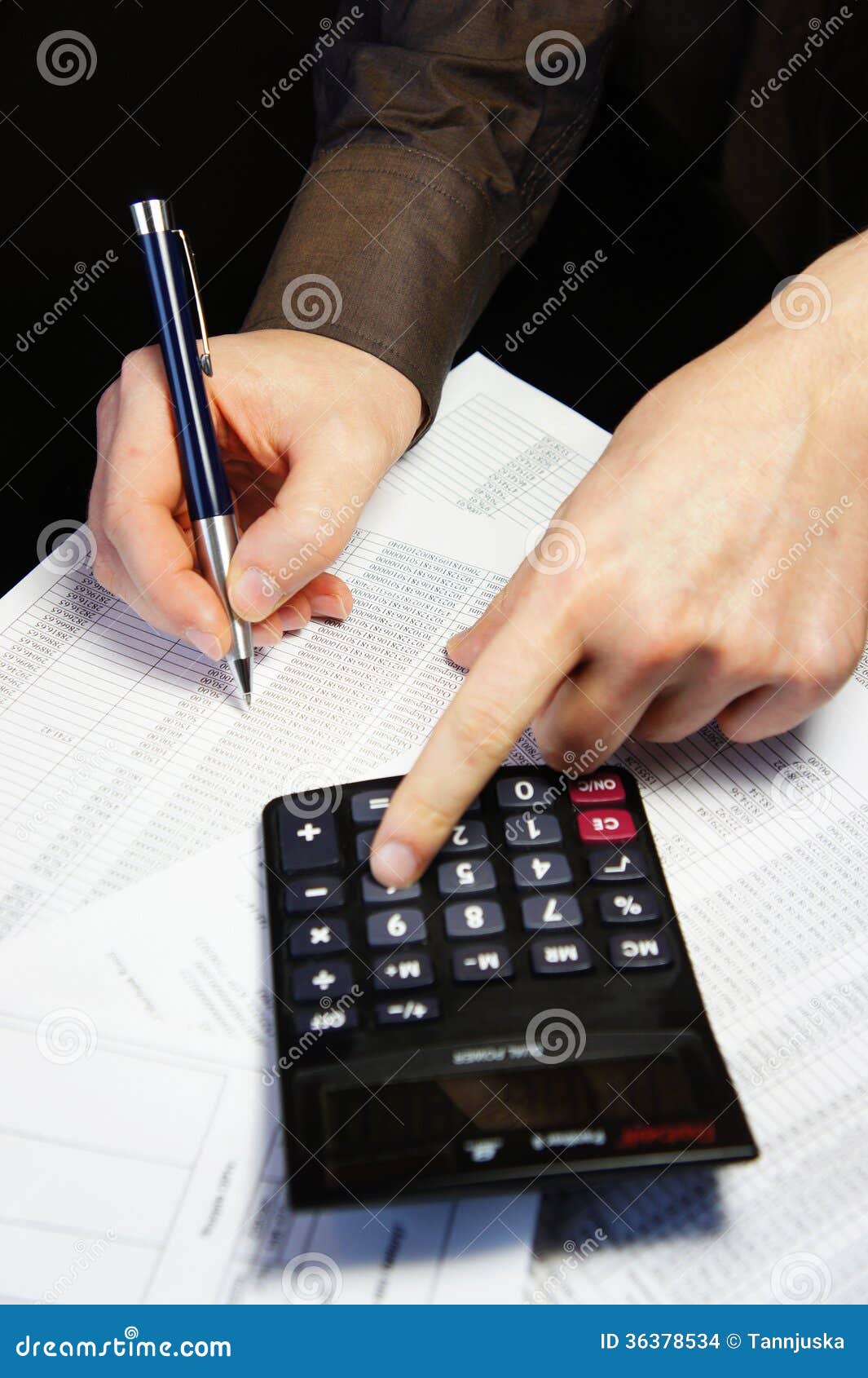 Office Table with Calculator, Pen and Accounting Document Stock Photo ...