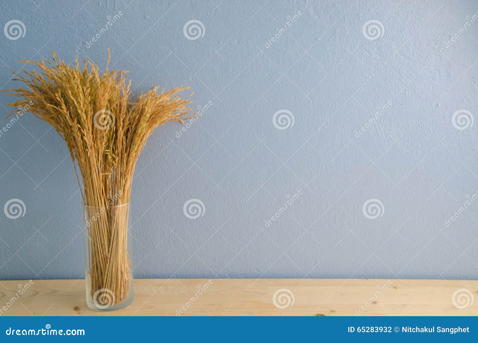 Office Table with Dried Rice Tree on Water Glass. Stock Photo - Image ...