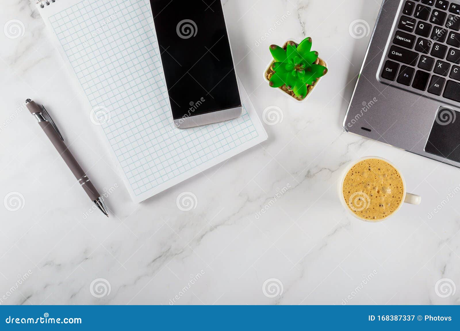 Office Table Overhead with Notebook, Computer Keyboard and Smartphone ...