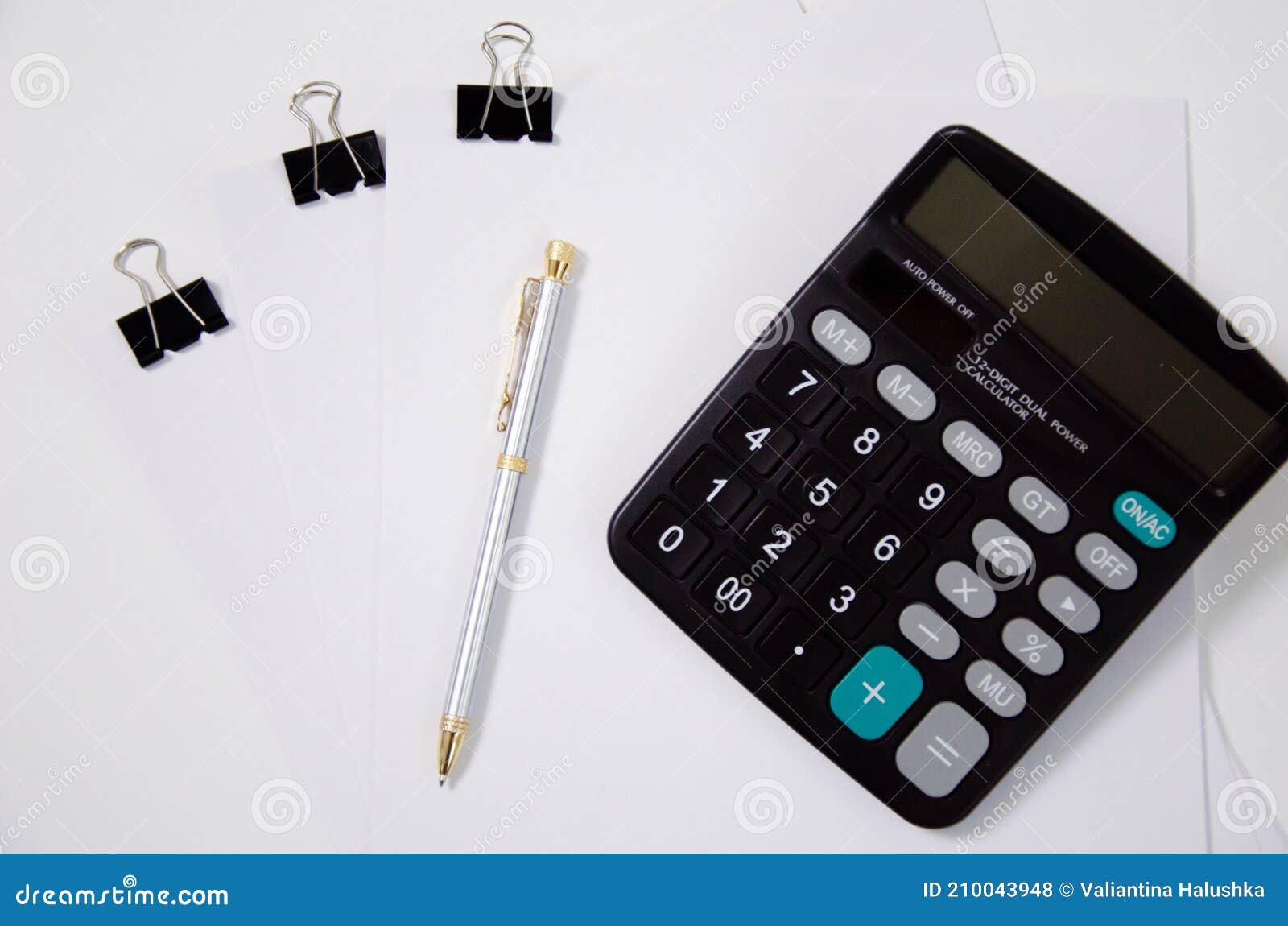 Office Table with Pen, Calculator and Empty Paper Stock Photo - Image ...