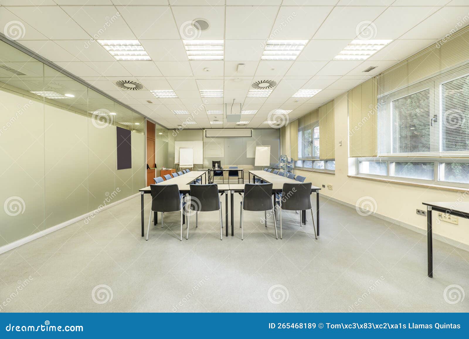 Office with a Training Room with a U-shaped Table Full of Chairs ...