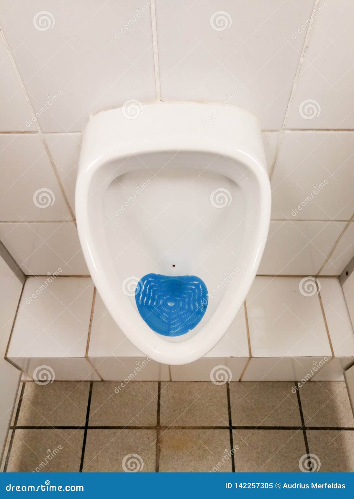 Office Urinal with Urinal Screen Close Up Stock Image - Image of object ...