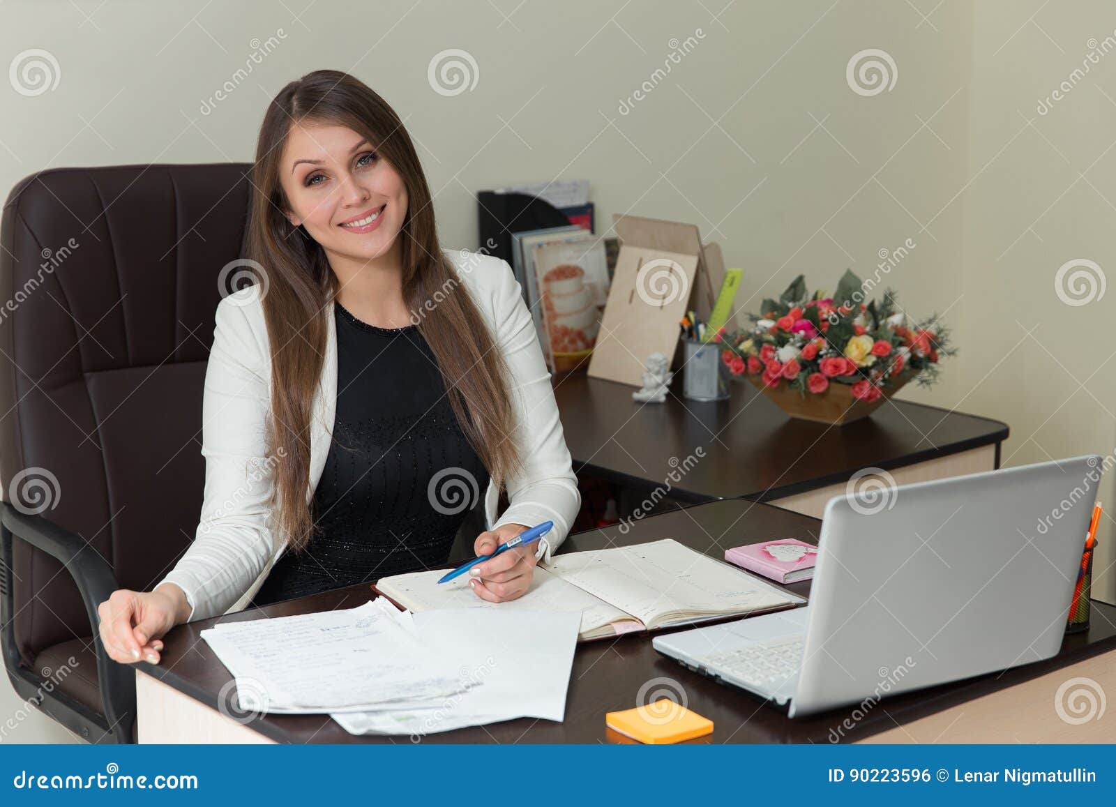 Office Woman Sitting at Her Desk with Laptop Computer and Documents ...