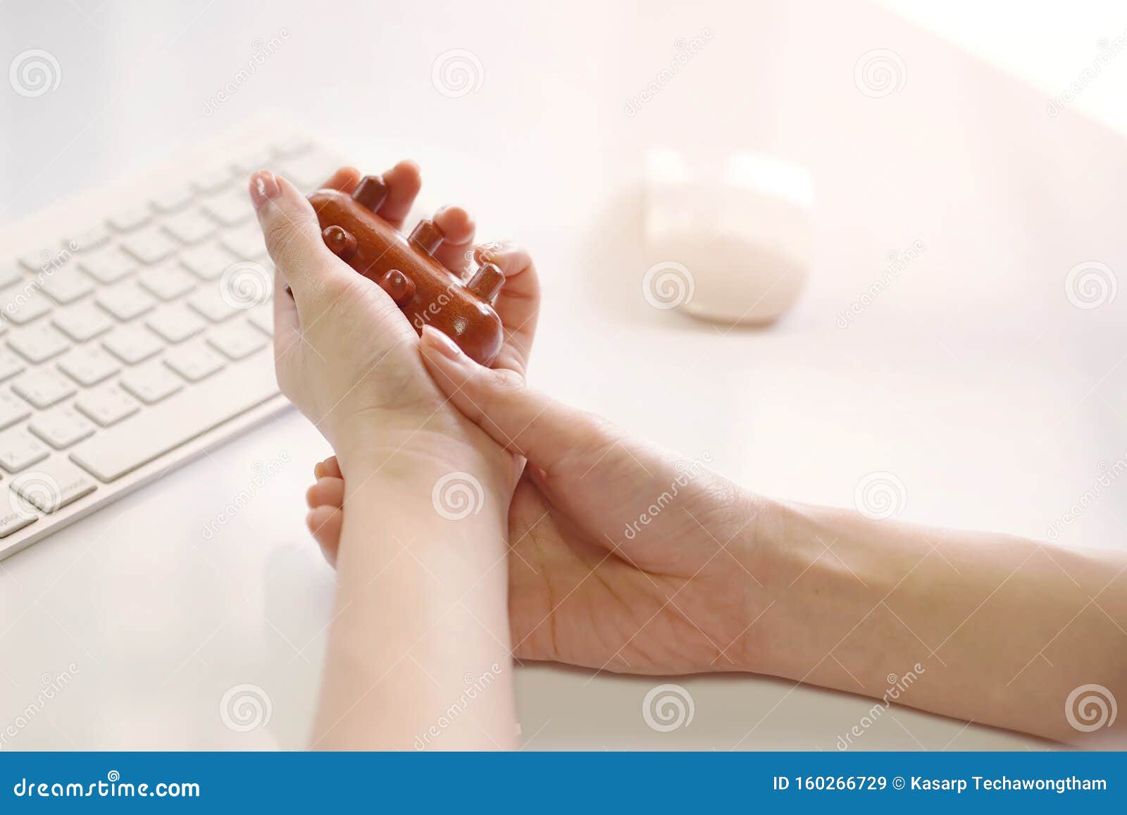 Office Woman Using Massage Stick for Stimulate Circulation, Decrease ...
