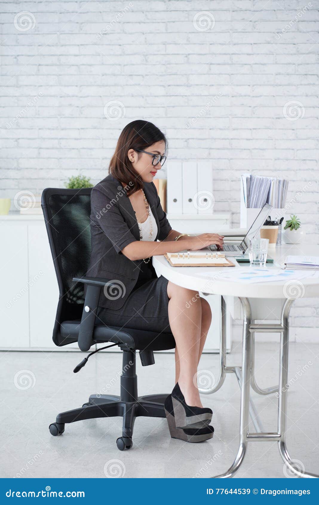 Office worker stock image. Image of lovely, reading, beautiful - 77644539