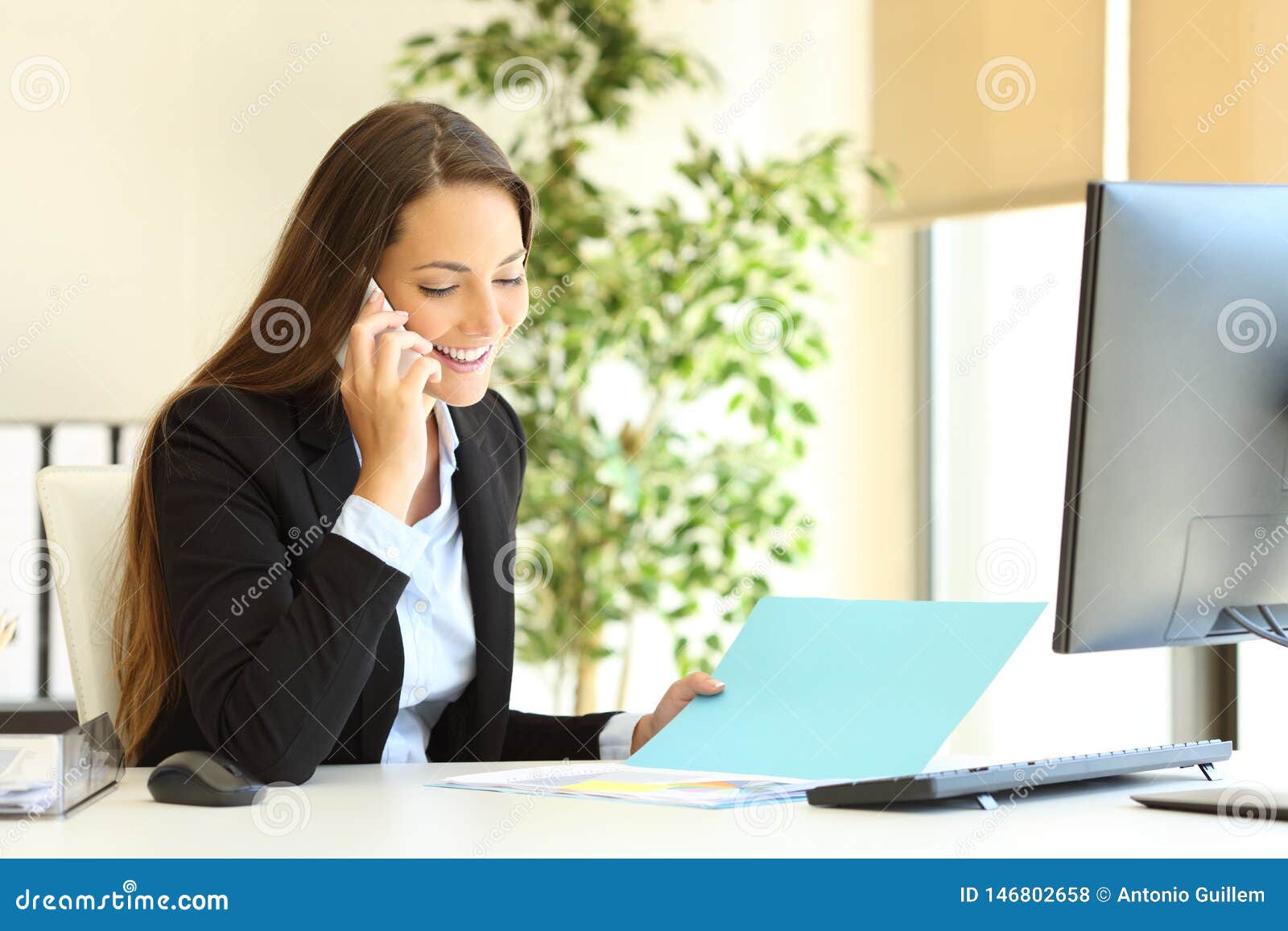 Office Worker Checking Document Talking on Phone Stock Photo - Image of ...