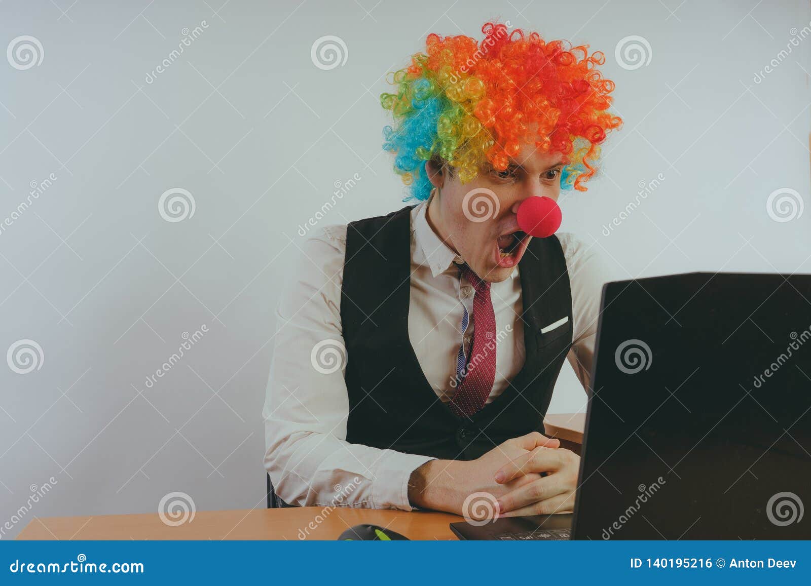 Office Worker in Clown Wig, Clown Concept at Work. Stock Photo - Image ...