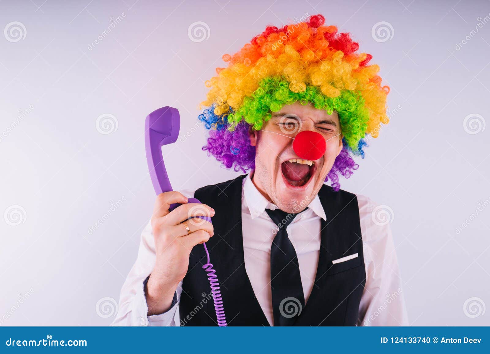 Office Worker in Clown Wig, Clown Concept at Work. Businessman with ...