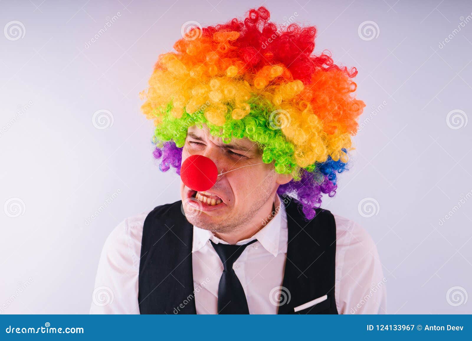 Office Worker in Clown Wig, Clown Concept at Work. Businessman with ...