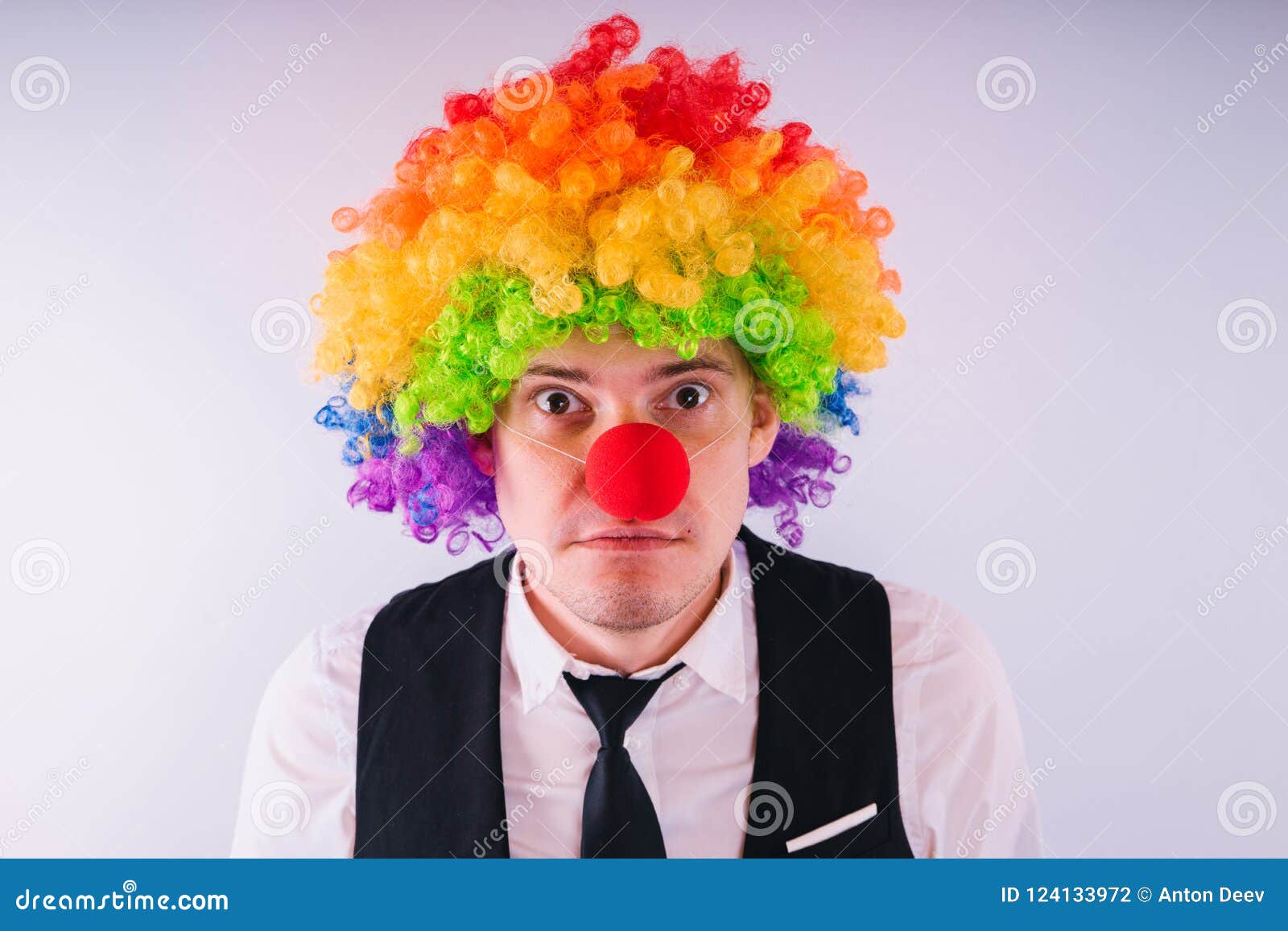 Office Worker in Clown Wig, Clown Concept at Work. Businessman with ...