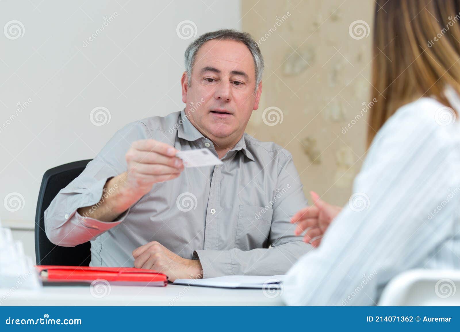 Office Worker Giving Businesscard To Worker Stock Photo - Image of ...