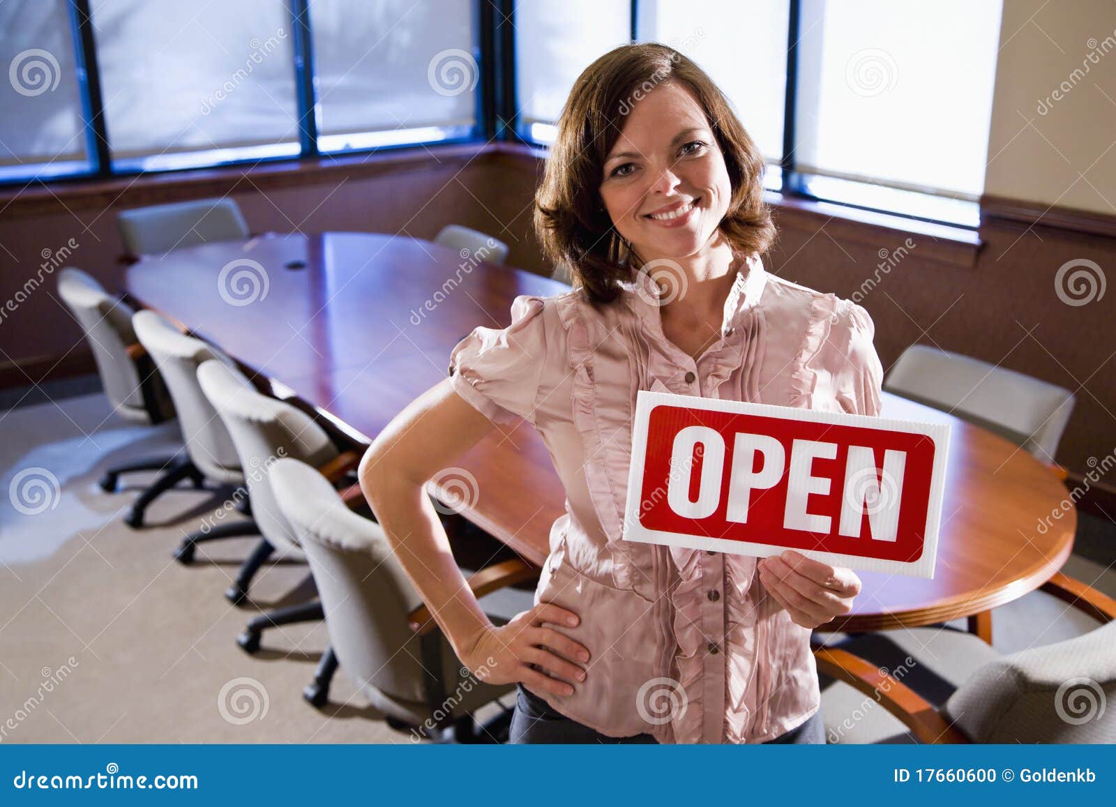 Office Worker Holding Open Sign in Empty Boardroom Stock Photo - Image ...