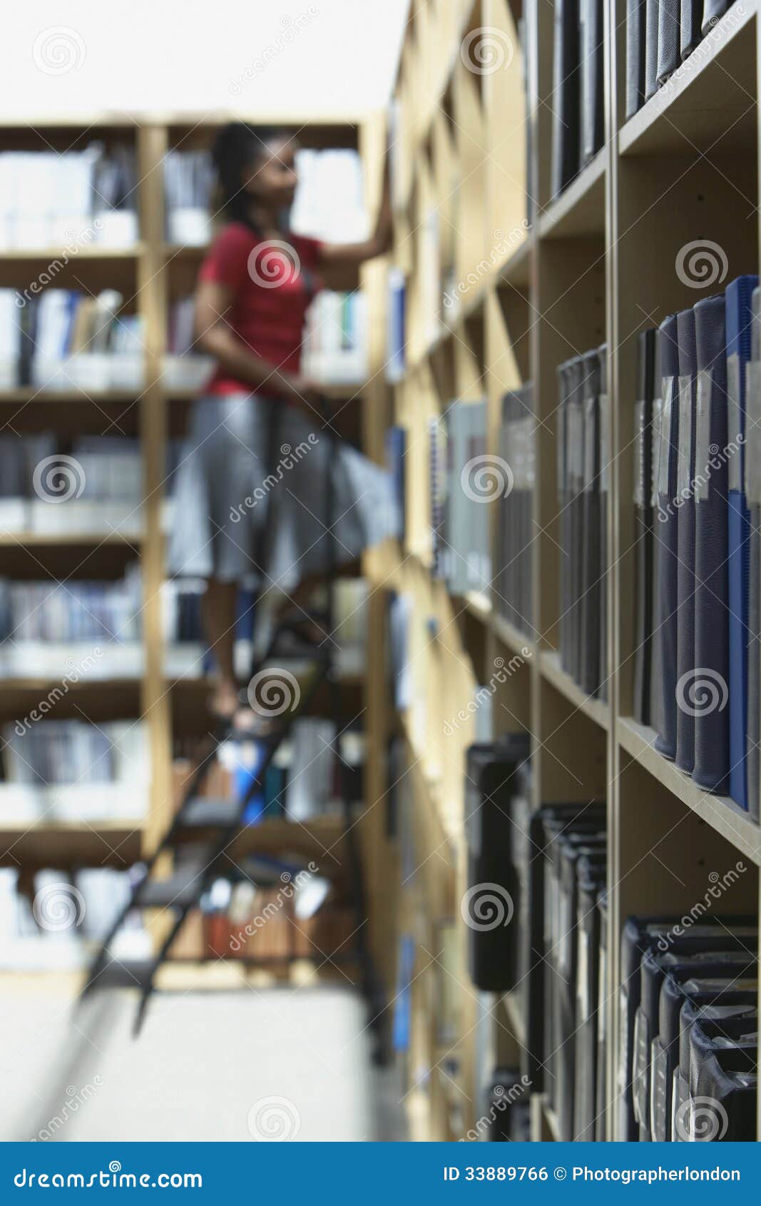 Office Worker on Ladder in File Storage Room Stock Photo - Image of ...