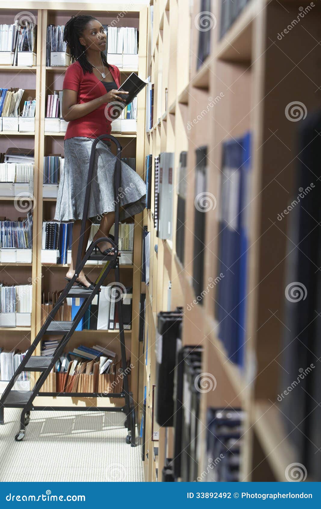 Office Worker on Ladder in File Storage Room Stock Photo - Image of ...