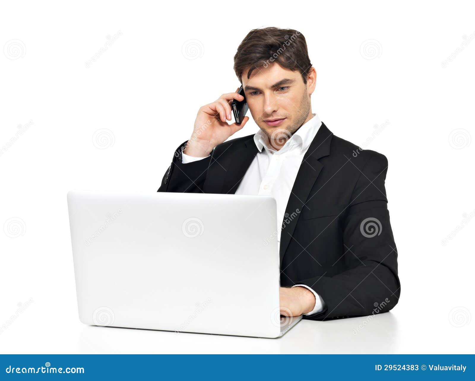 Office Worker with Laptop Speaks by Mobile Phone Stock Image - Image of ...
