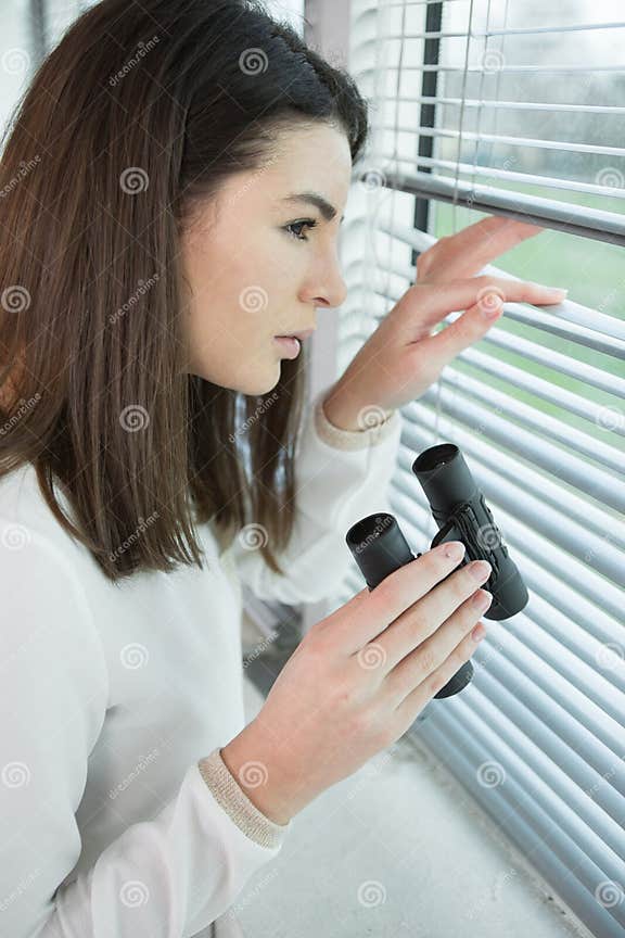 Office Worker Looking Out Window with Binoculars Stock Photo - Image of ...