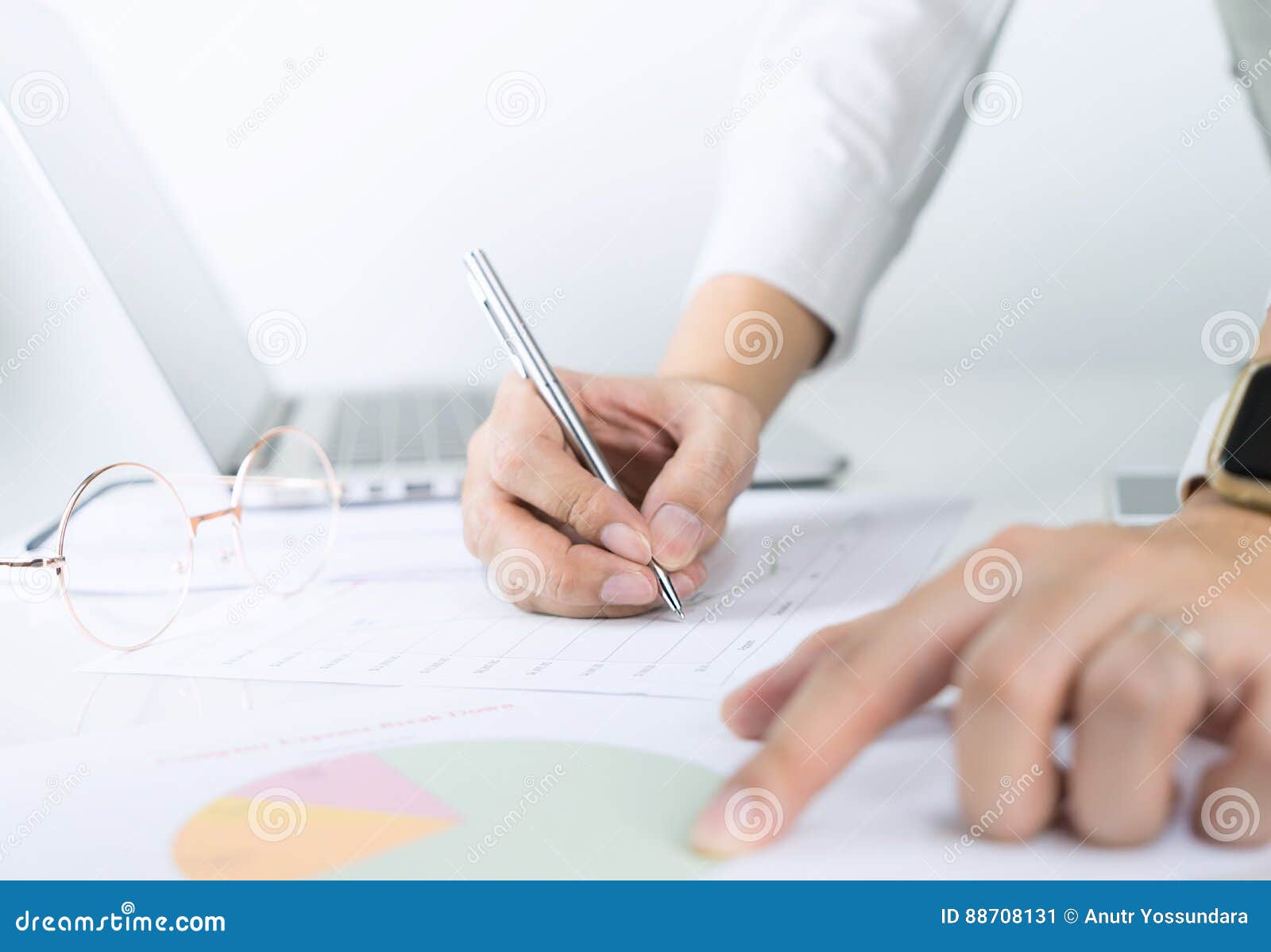 Office Worker is Pointing and Analyzing Paper Chart Infomation Stock ...