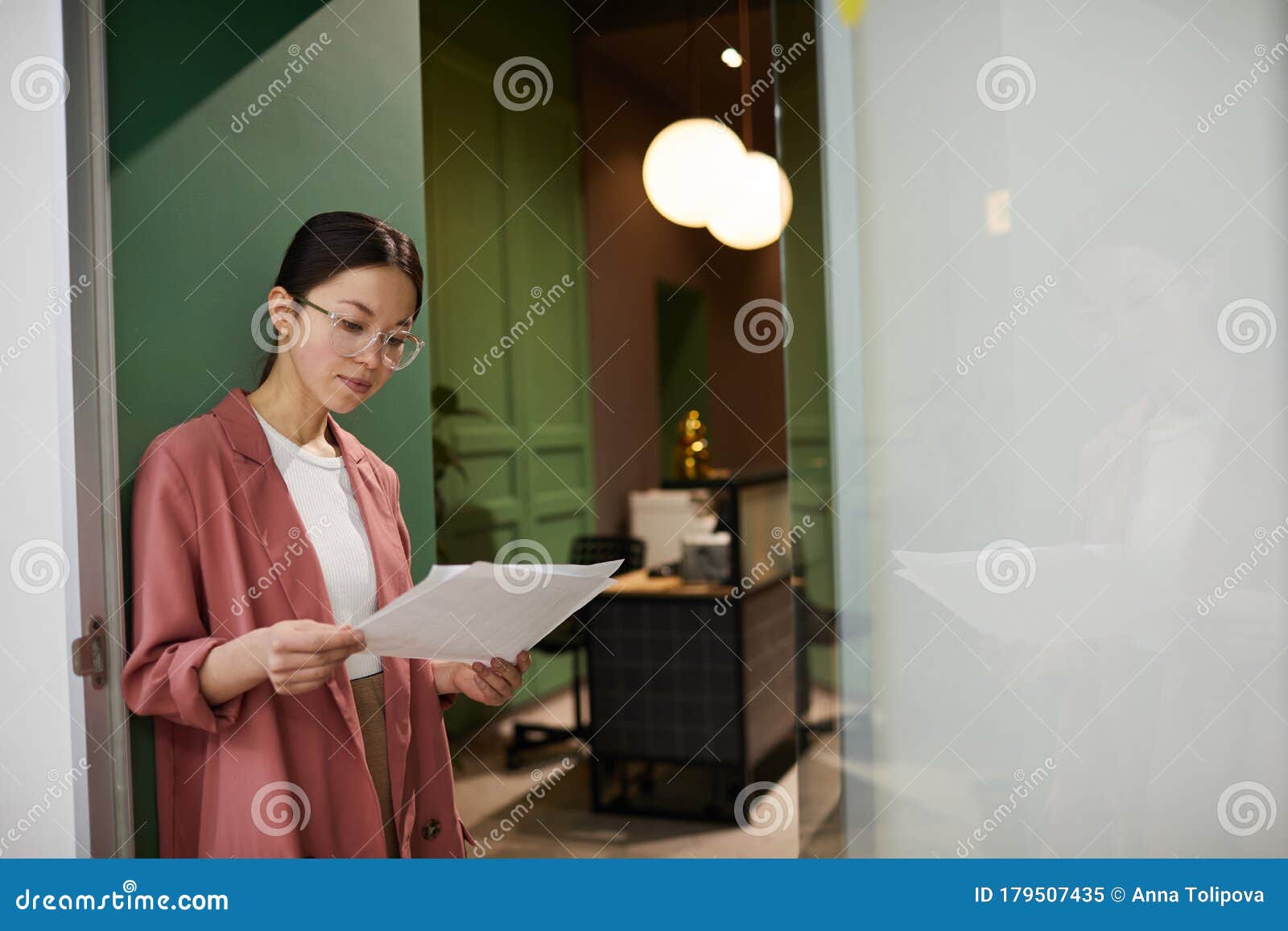 Office Worker Reading Documents Stock Image - Image of adult, holding ...
