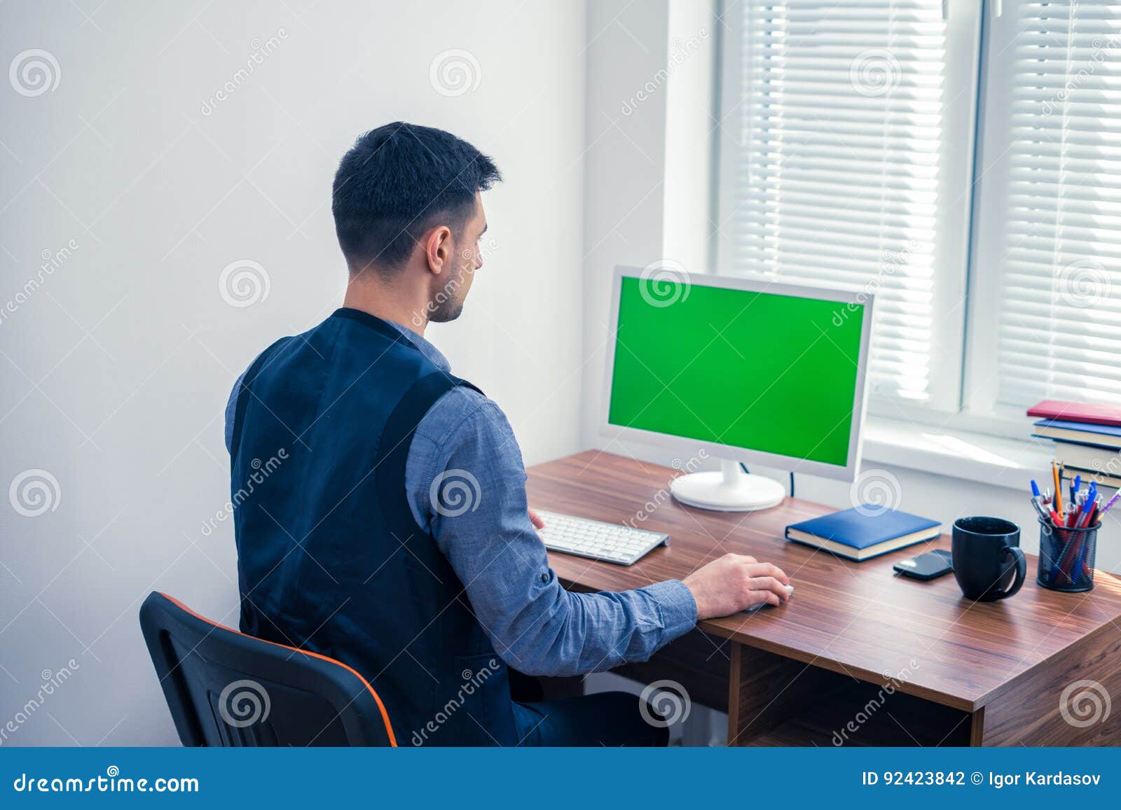 Office Worker Sitting at Computer with Chromakey on Monitor Stock Photo ...