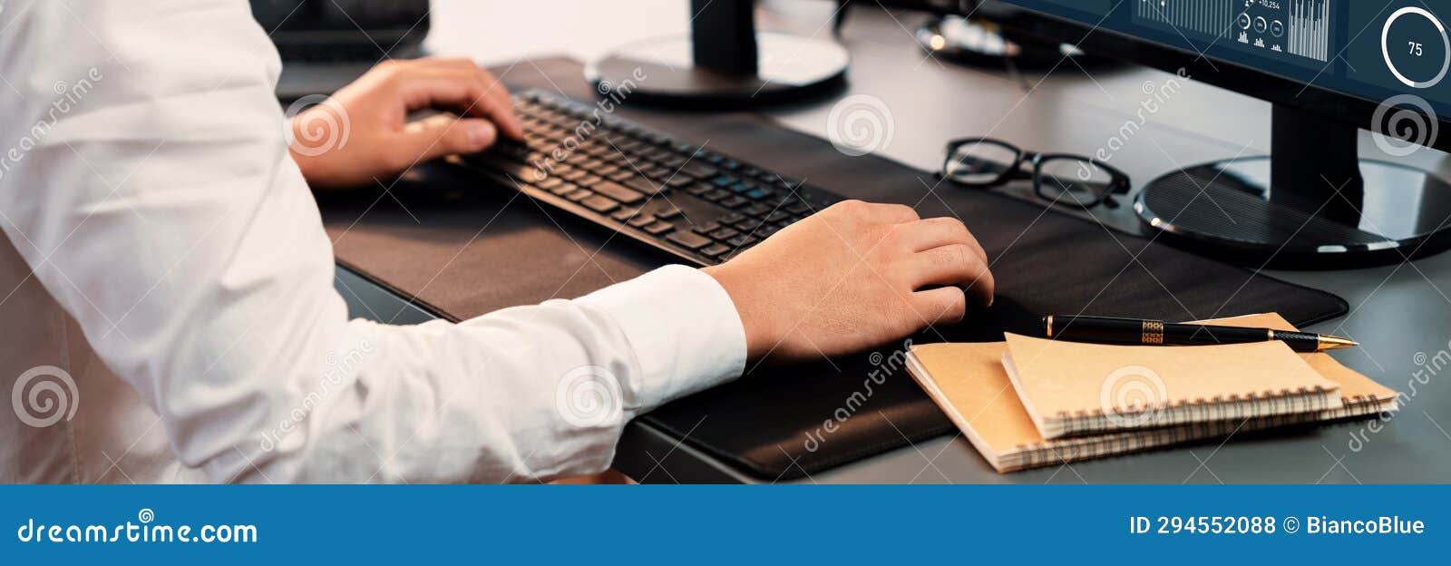Office Worker Sitting on Workspace Desk Typing on Keyboard ...
