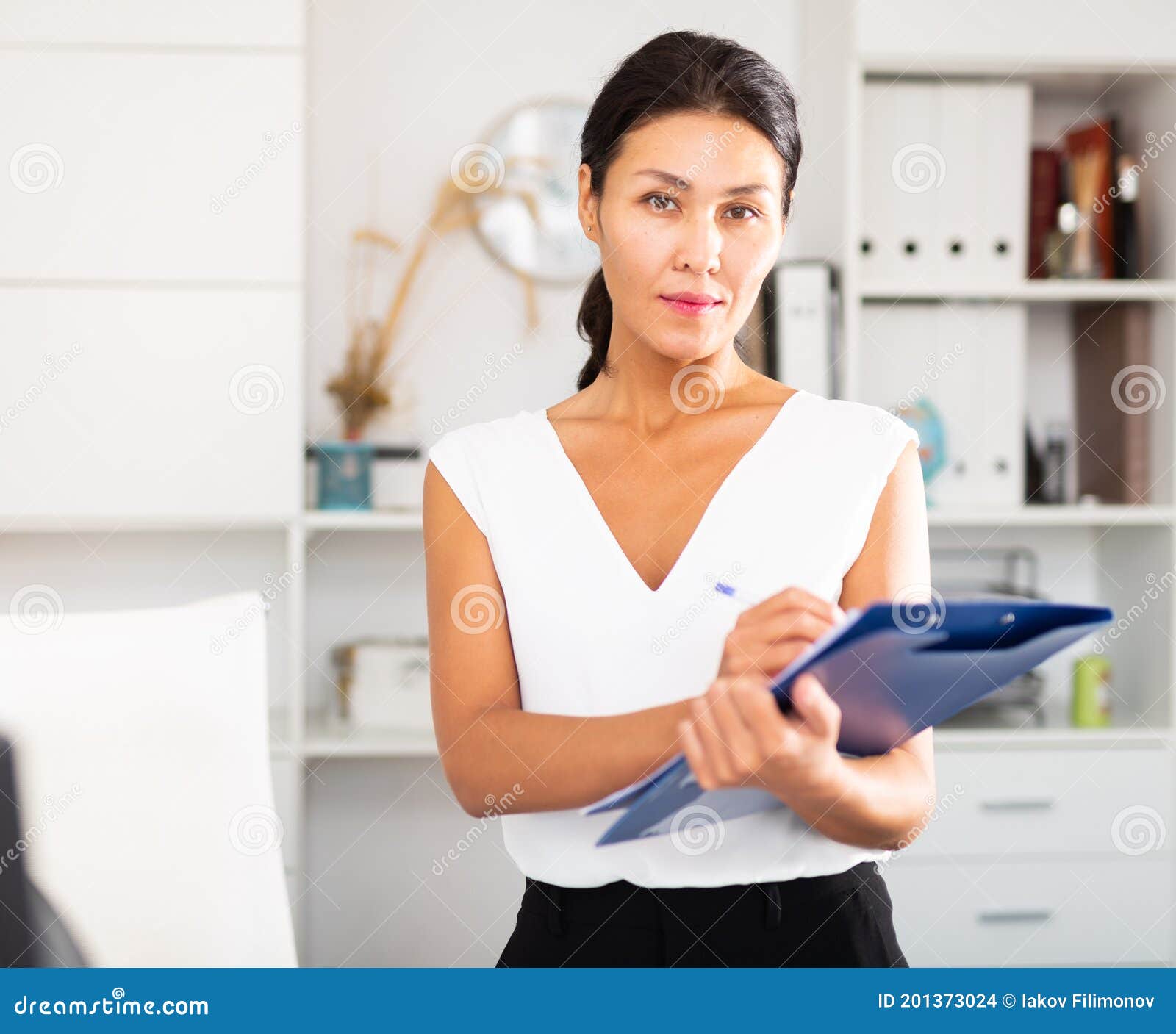 Office Worker is Standing with Documents before Signing it in Office ...
