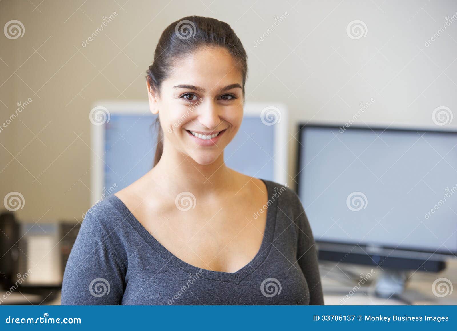 Office Worker Standing in Front of Computers Stock Image - Image of ...