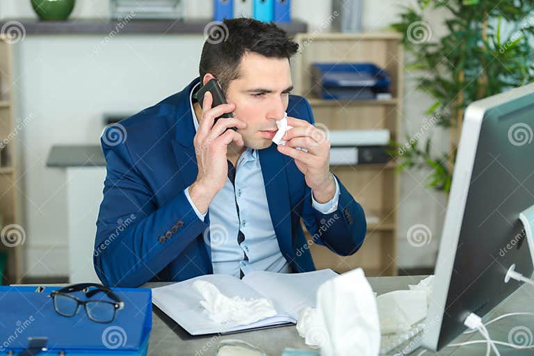 Office Worker Still Working Even Though Sick Stock Photo - Image of ...
