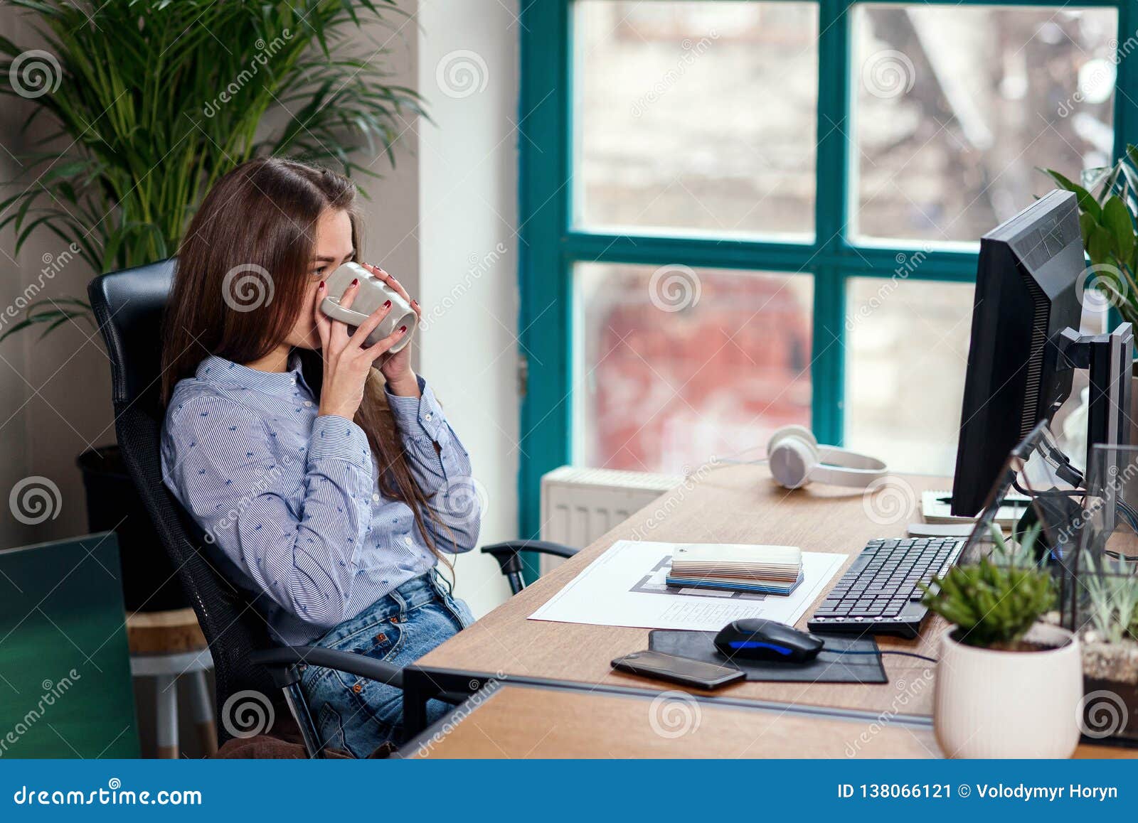 Office Worker Taking a Coffee Break with a Cup of Espresso in Her Hands ...
