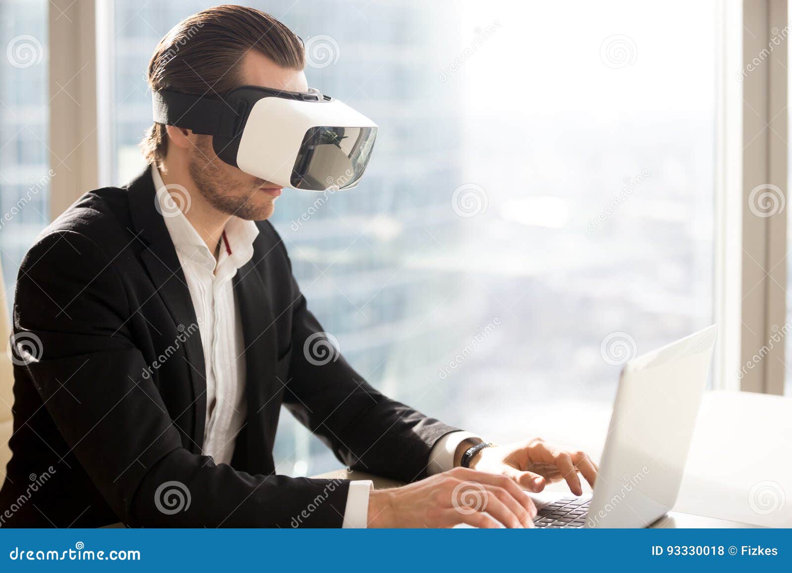 Office Worker Typing on Laptop in Virtual Goggles Stock Photo - Image ...