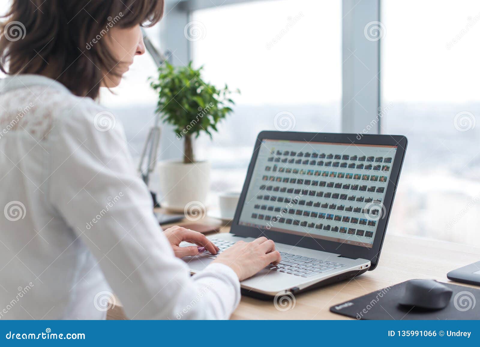 Office Worker Typing, Working at Her Workplace, Using Laptop. Stock ...