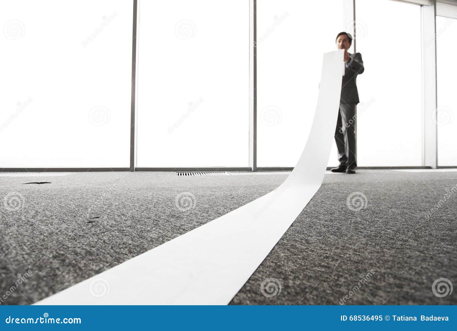 Office Worker Unrolling Long Sheet Stock Image - Image of executive ...