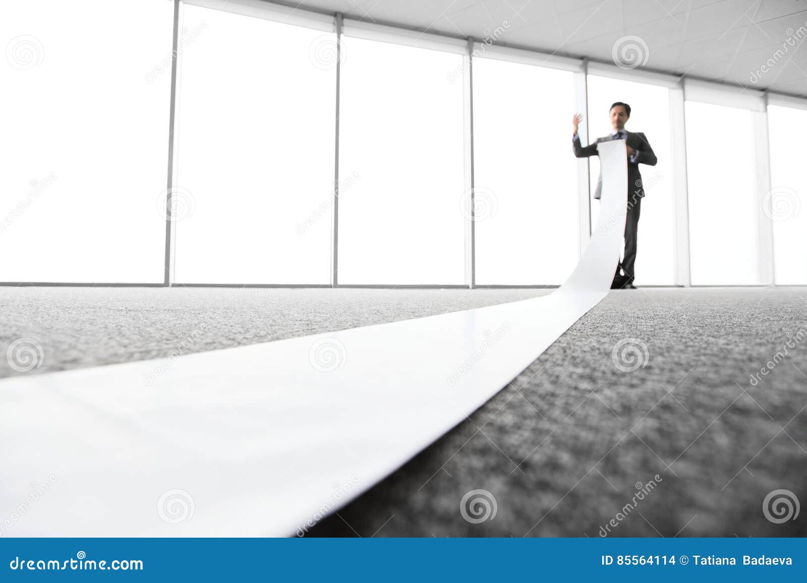 Office Worker Unrolling Long Sheet Stock Photo - Image of concept ...