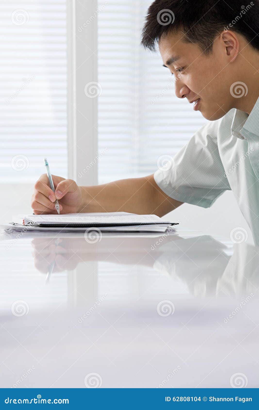 Office worker writing stock photo. Image of chinese, employee - 62808104