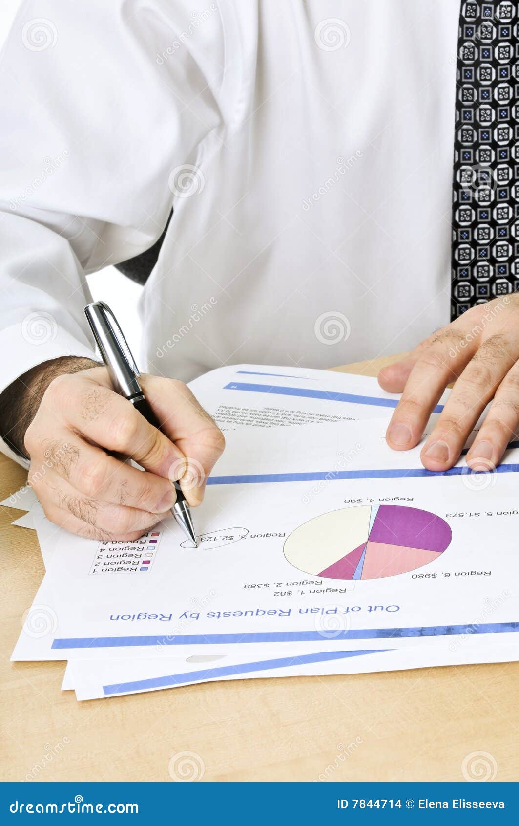 Office Worker Writing on Reports Stock Photo - Image of paper, charts ...