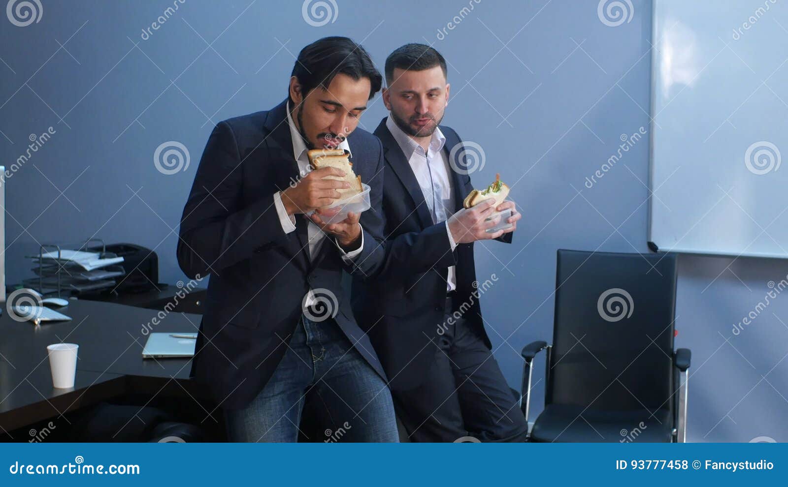 Office Workers Have a Break from Work To Eat Second Breakfast Stock ...