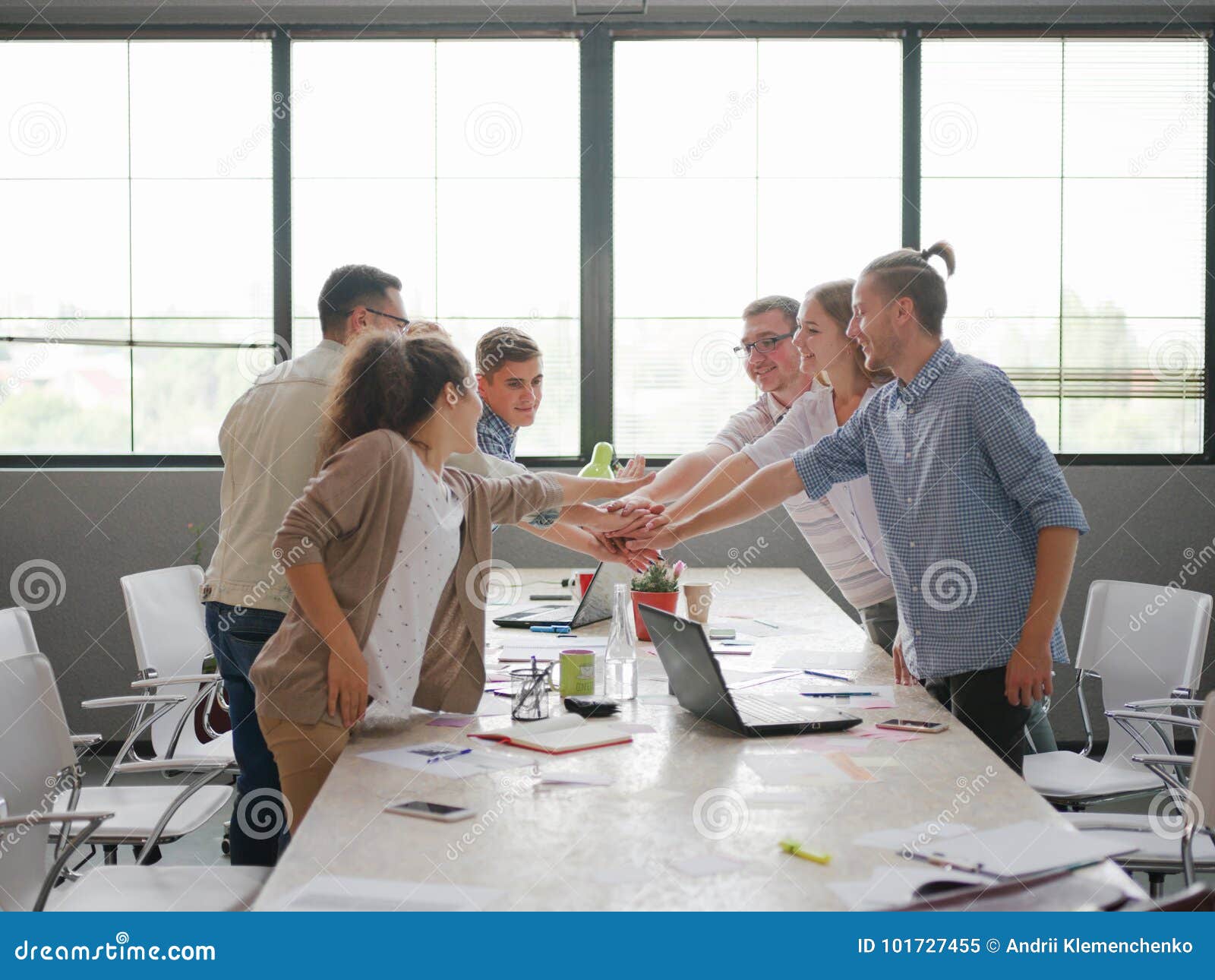 Office Workers Join Hands for a Good Start Stock Image - Image of ...
