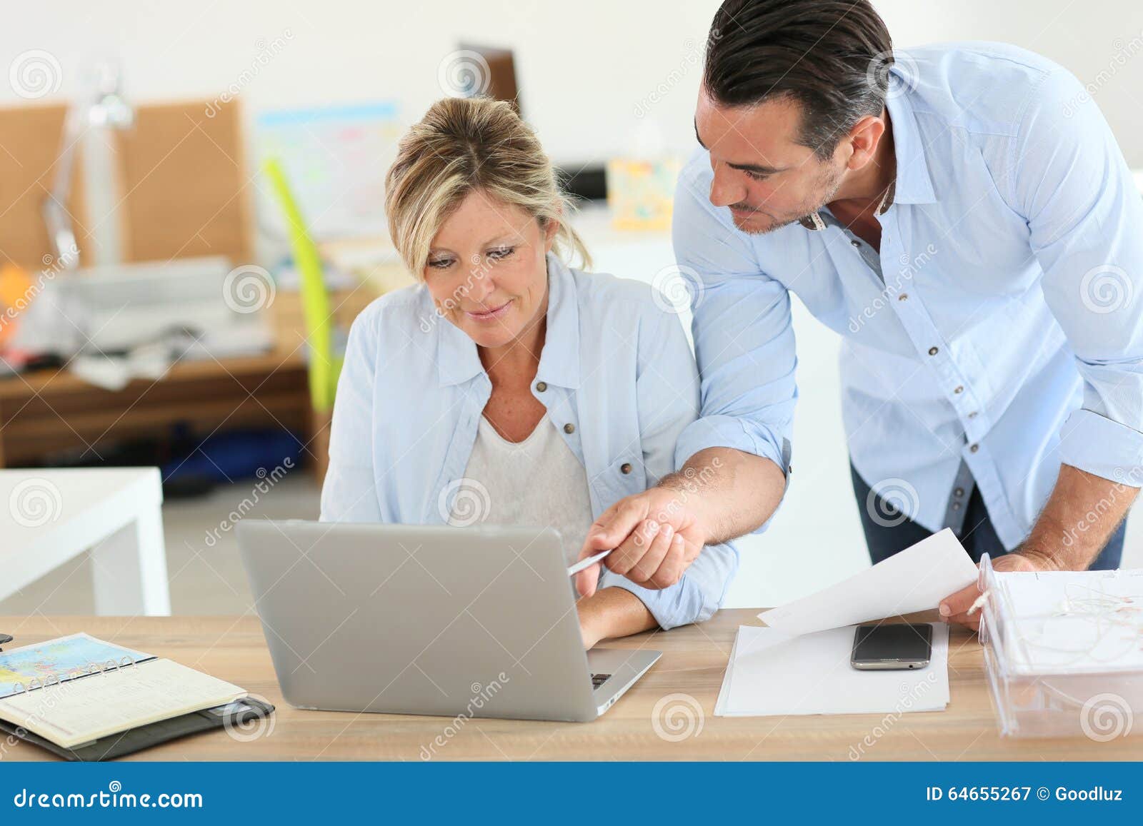 Office workers on laptop stock image. Image of laptop - 64655267