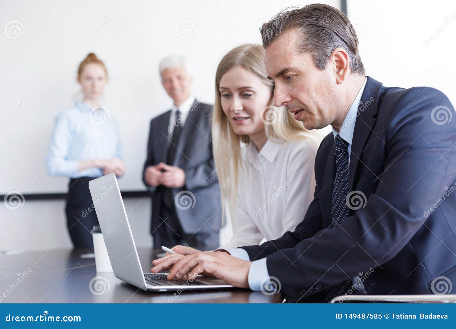Office workers and laptop stock image. Image of contemporary - 149487585