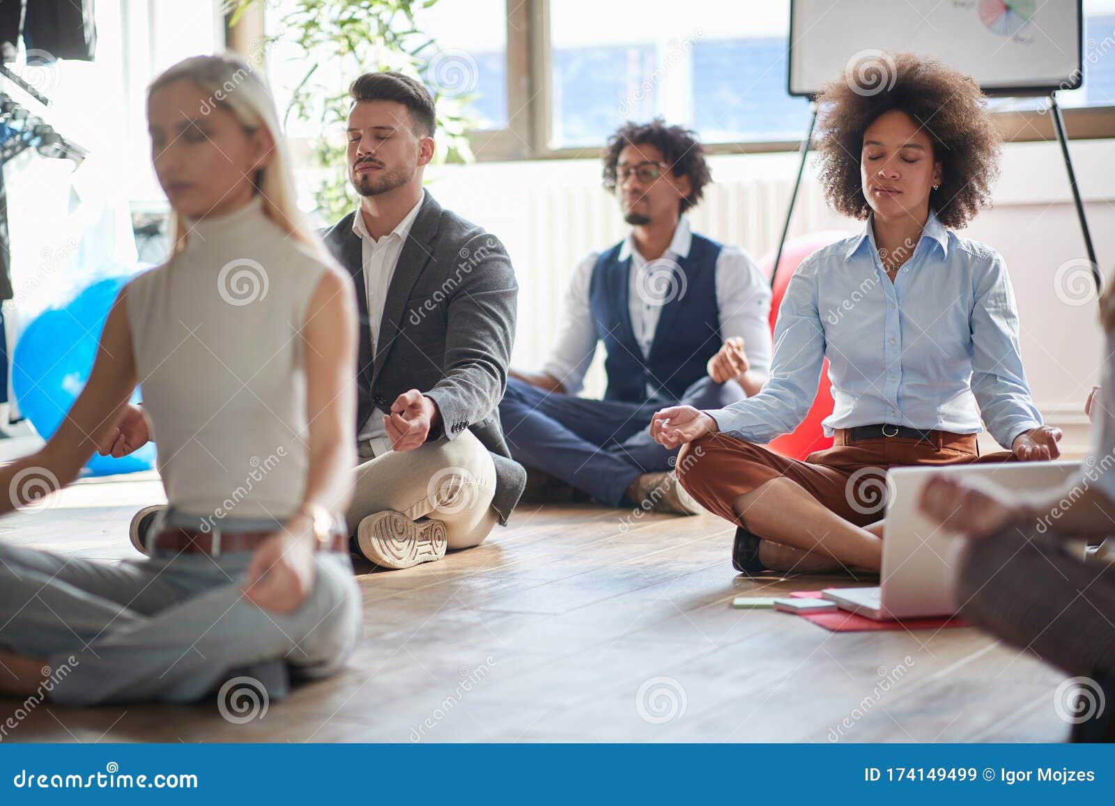 Office Workers Meditating at Work.Meditating at Office Stock Image ...