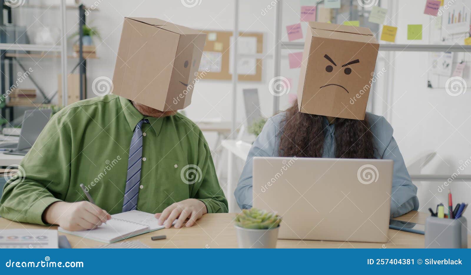 Office Workers with Paper Bag Heads Showing Emoji Working at Project at ...