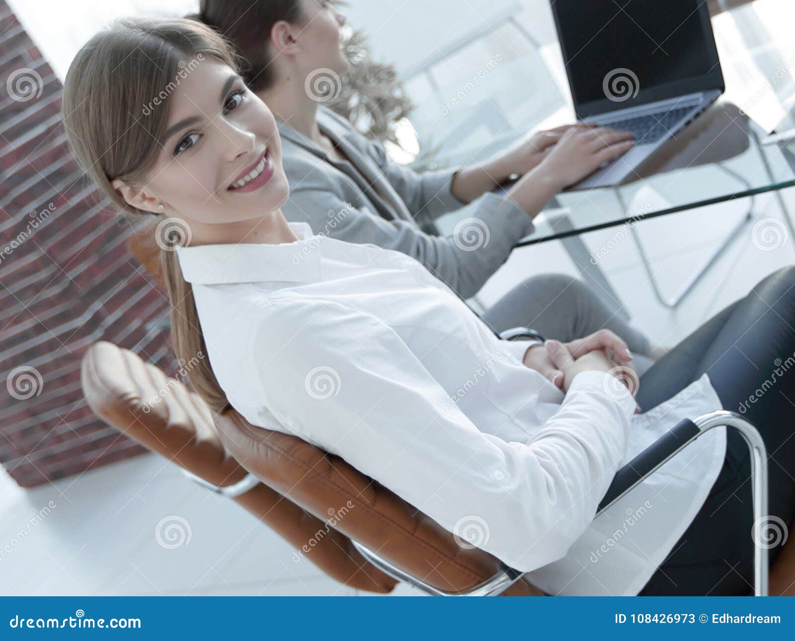 Office Workers Sitting Behind a Desk. Stock Image - Image of assistant ...