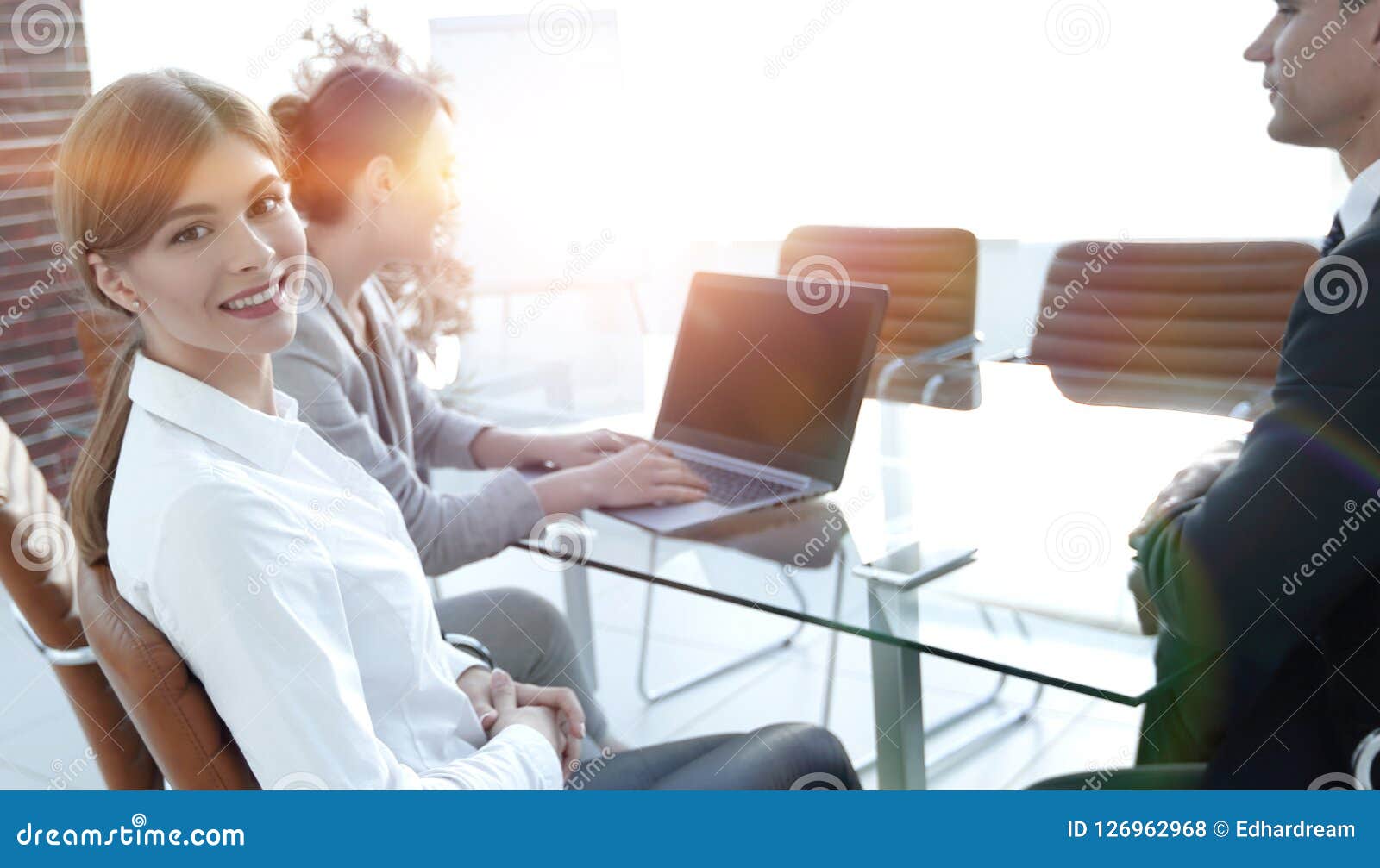Office Workers Sitting Behind a Desk. Stock Photo - Image of luminous ...