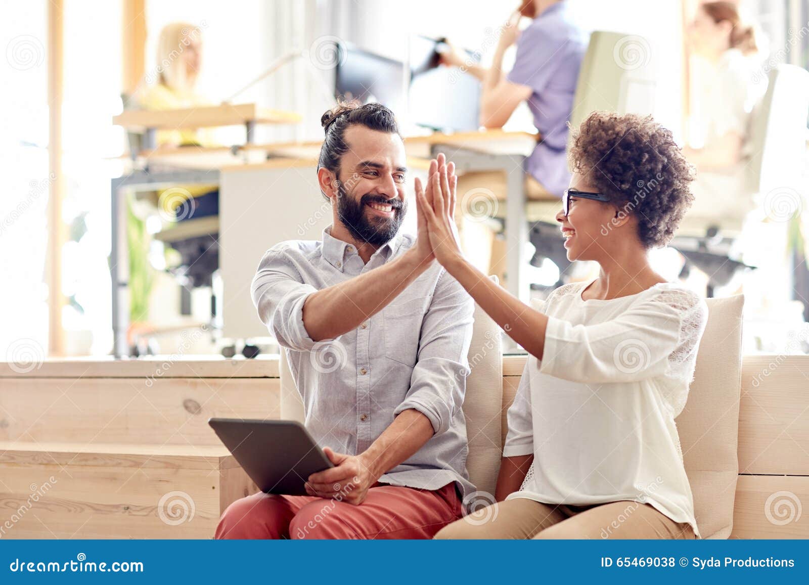 Office Workers with Tablet Pc Making High Five Stock Photo - Image of ...