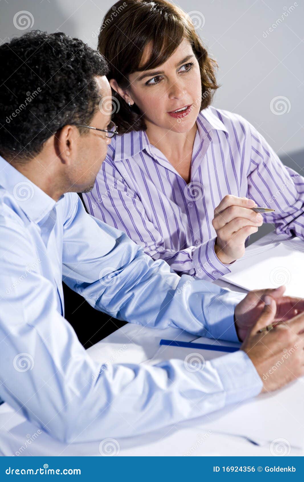 Office Workers Talking while Watching Presentation Stock Photo - Image ...
